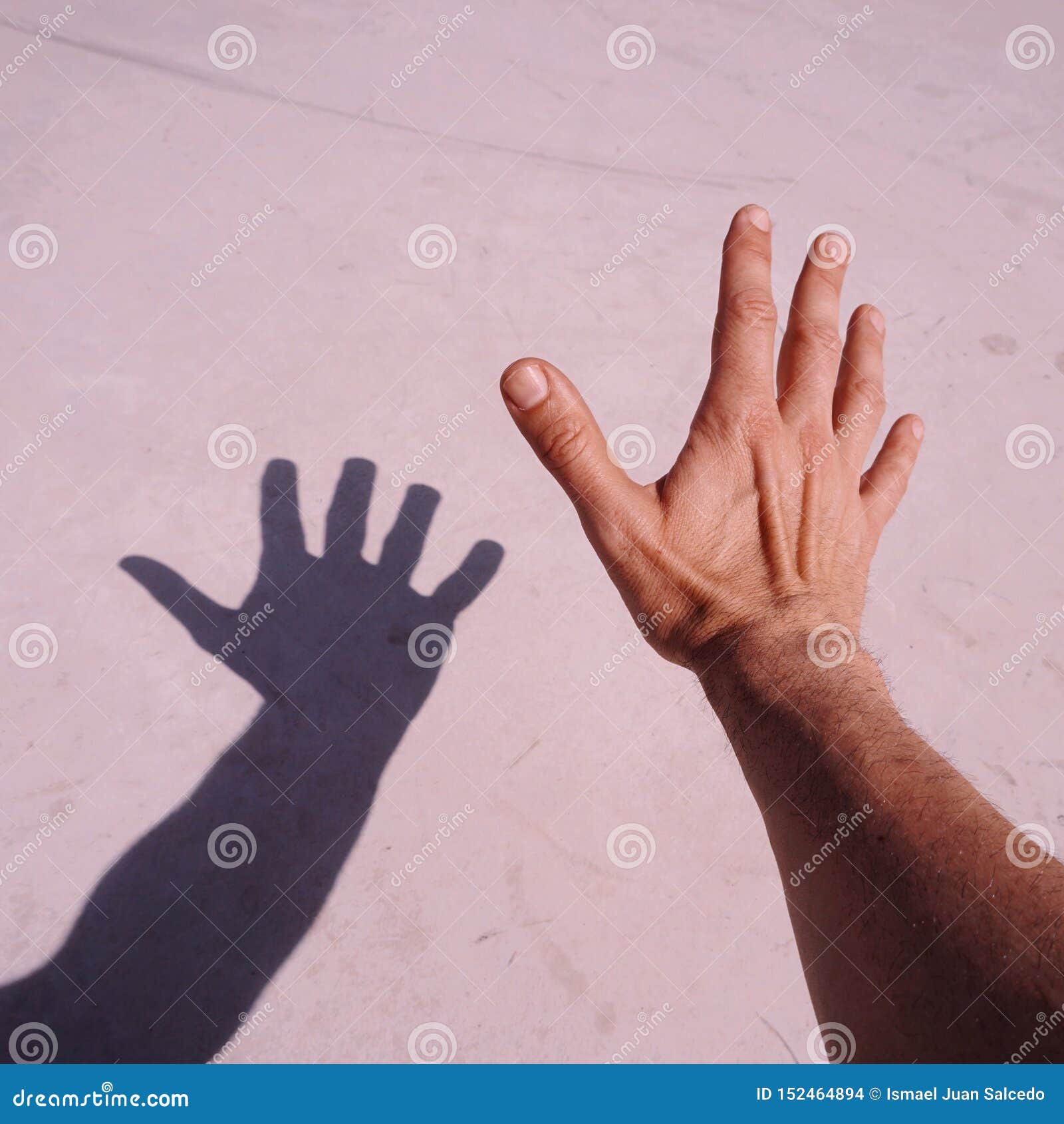 Man hand shadow silhouette stock photo. Image of concept - 152464894