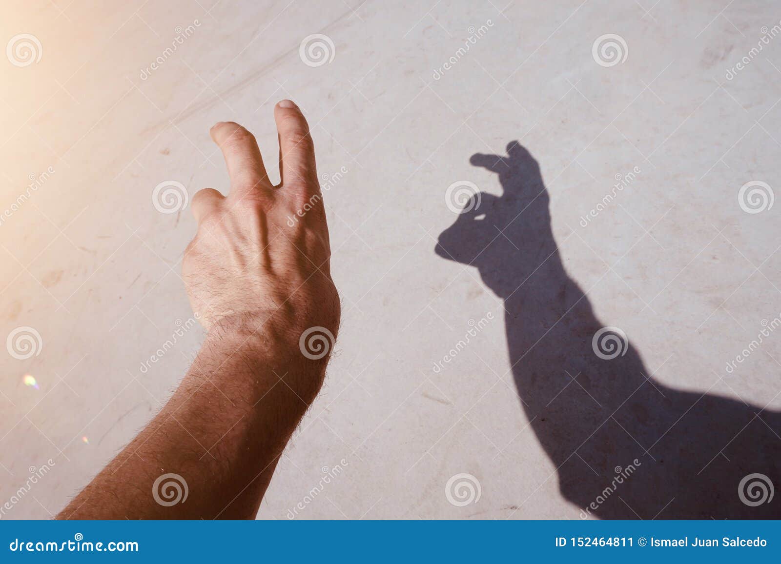 Man hand shadow silhouette stock image. Image of street - 152464811