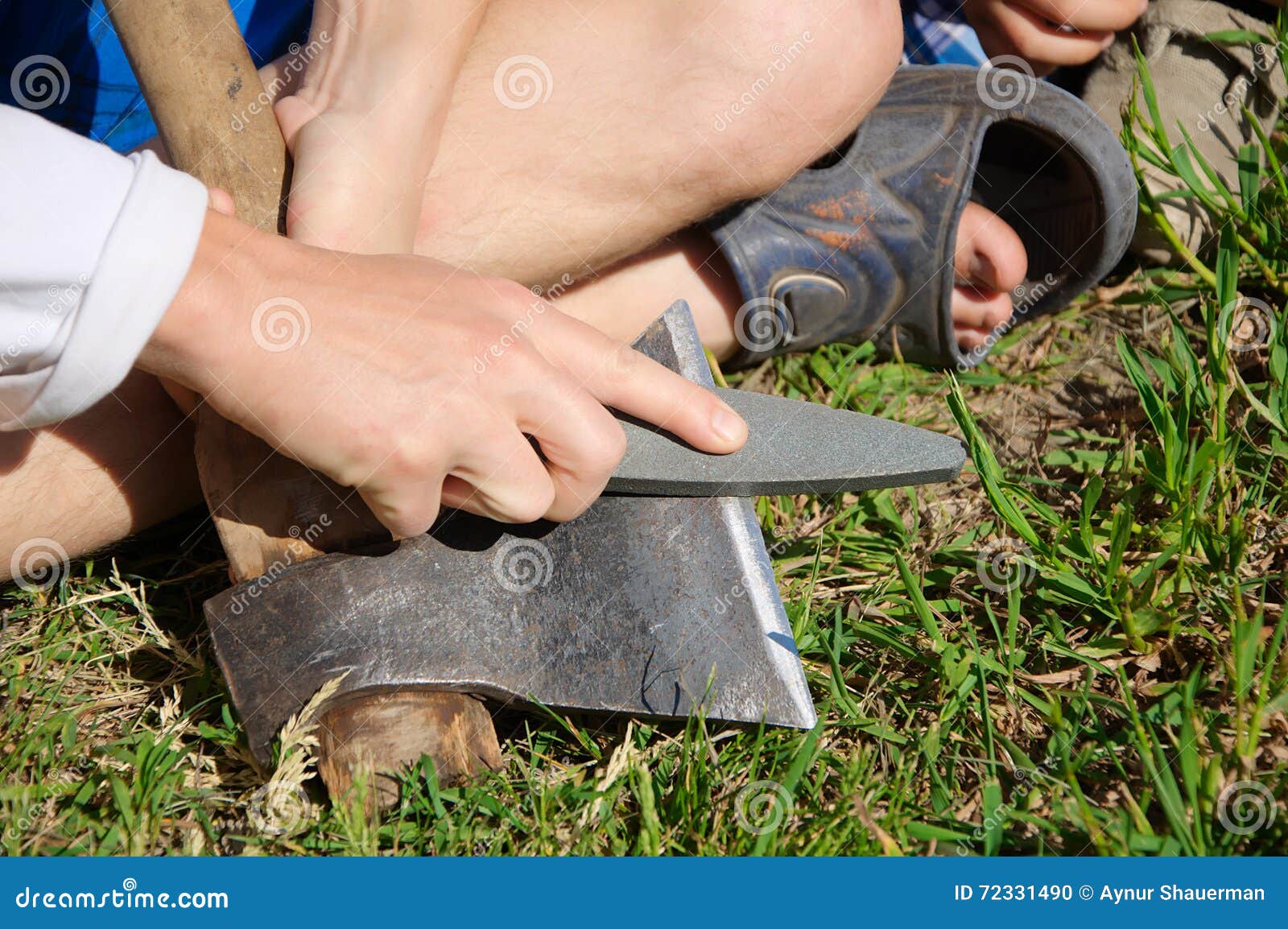 Man Hand Sharpening Axe Blade Stock Photo - Image of hatchet, tine ...