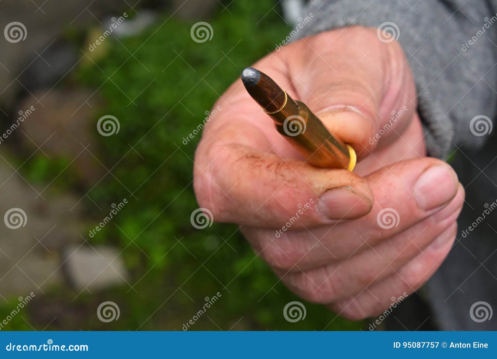 Man Hand Showing 7.62 Caliber Ammunition Bullet Stock Image - Image of ...
