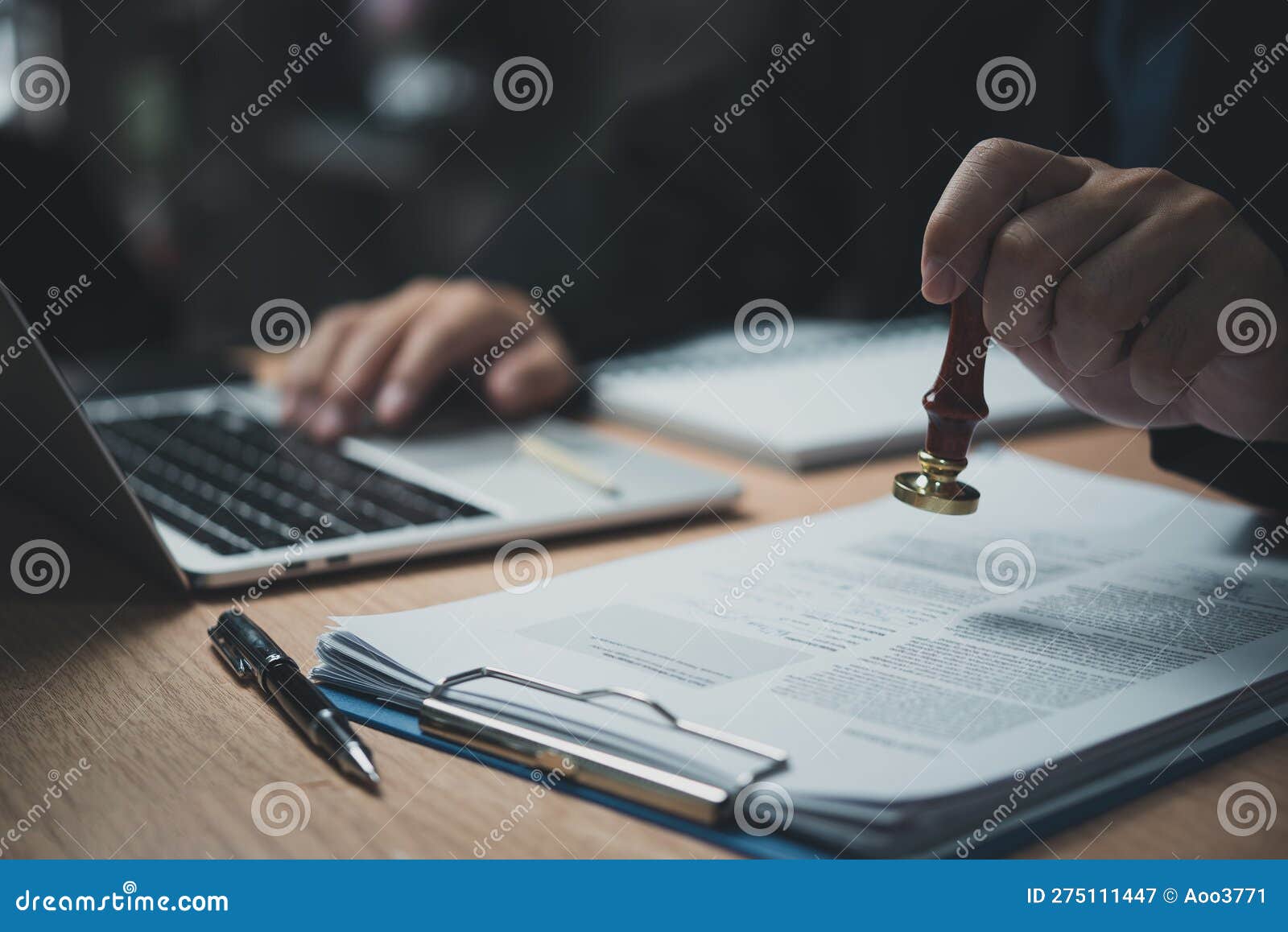 Man Hand Stamping Approval Signing on Document or Paperwork Contract at ...