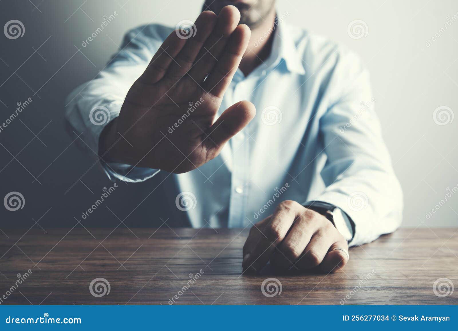Man Hand Stop Sign on Table Stock Photo - Image of professional, career ...