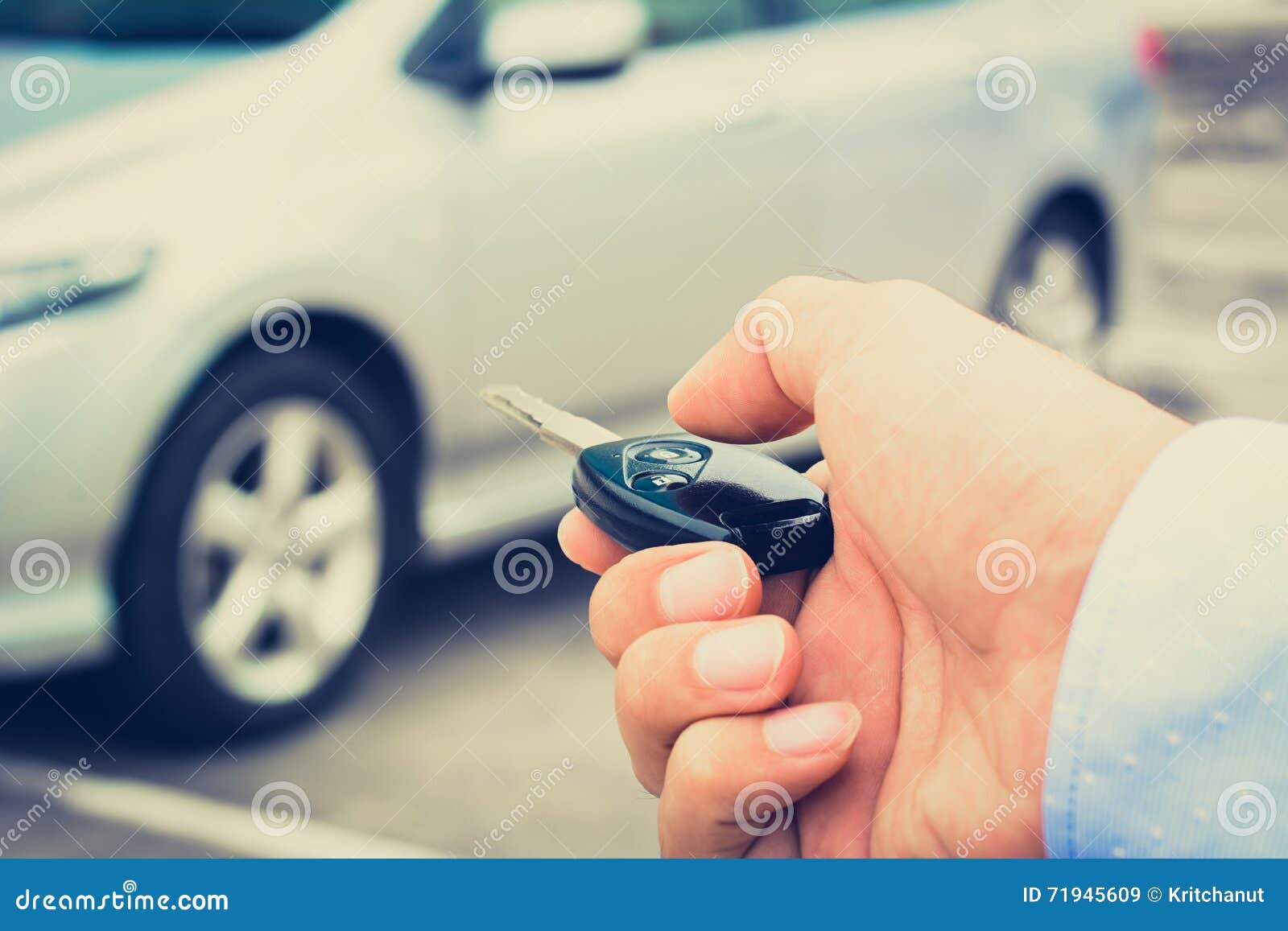 A Man Hand about To Press Button of Remote Control Car Key Stock Image ...
