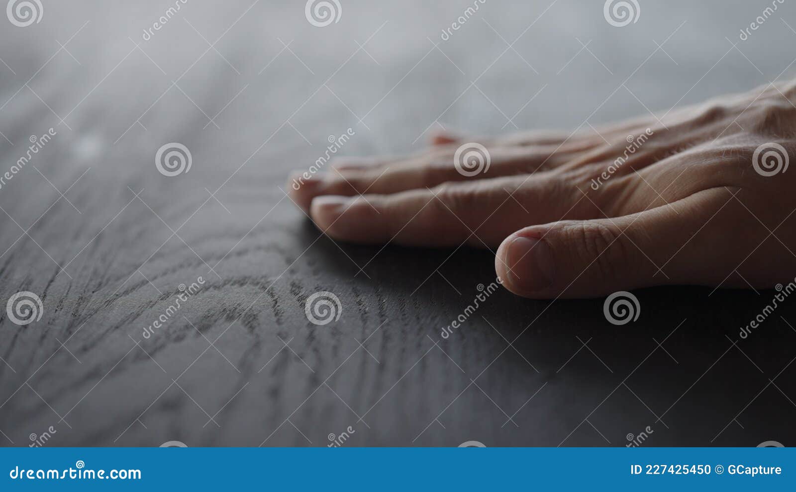 Man Hand Touches Black Oak Table Surface Stock Photo - Image of closeup ...