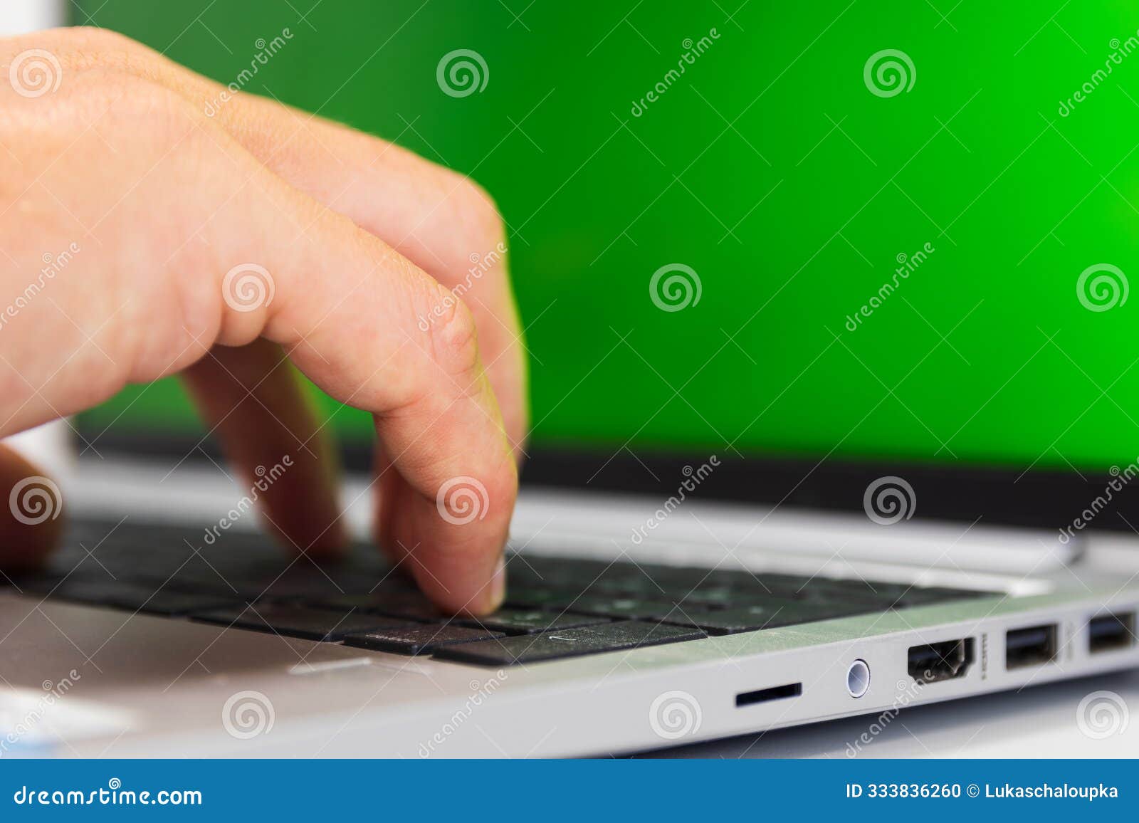Man Hand Typing on Metal Notebook Keyboard with Green Screen Stock ...