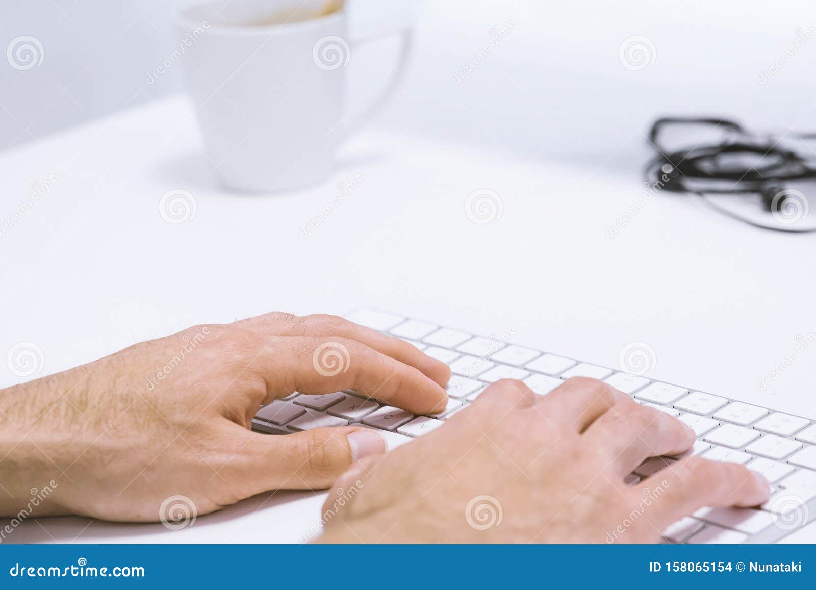 Man Hand Typing Working on Wireless Keyboard on White Work Place Stock ...