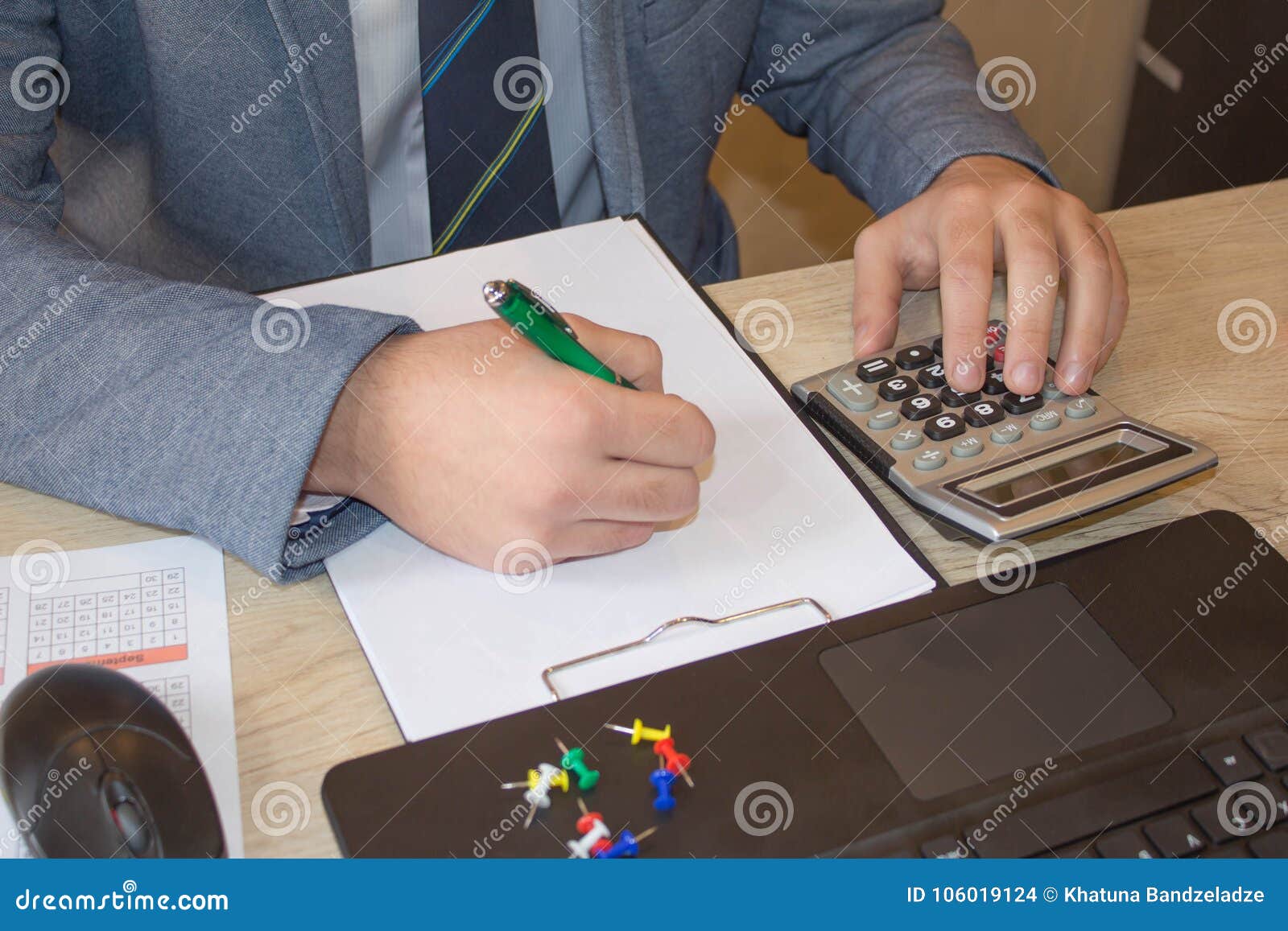 Man Hand Using Calculator and Writing Make Note with Calculate about ...