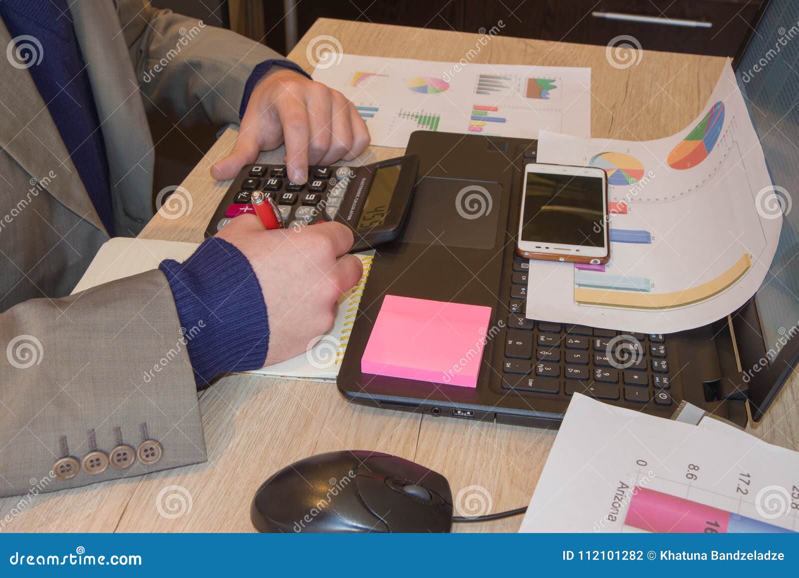 Man Hand Using Calculator and Writing Make Note with Calculate about ...