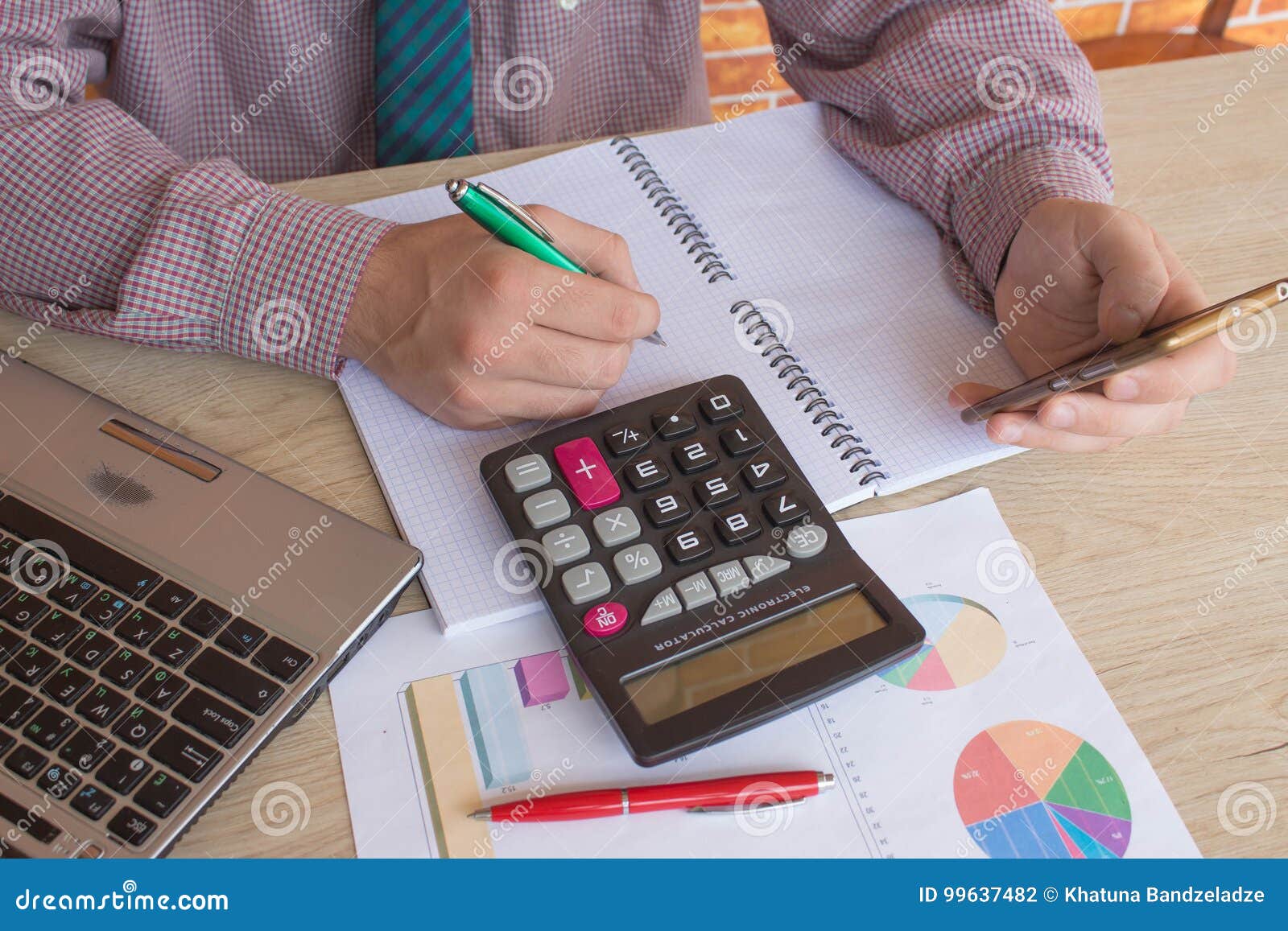 Man Hand Using Calculator and Writing Make Note with Calculate about ...