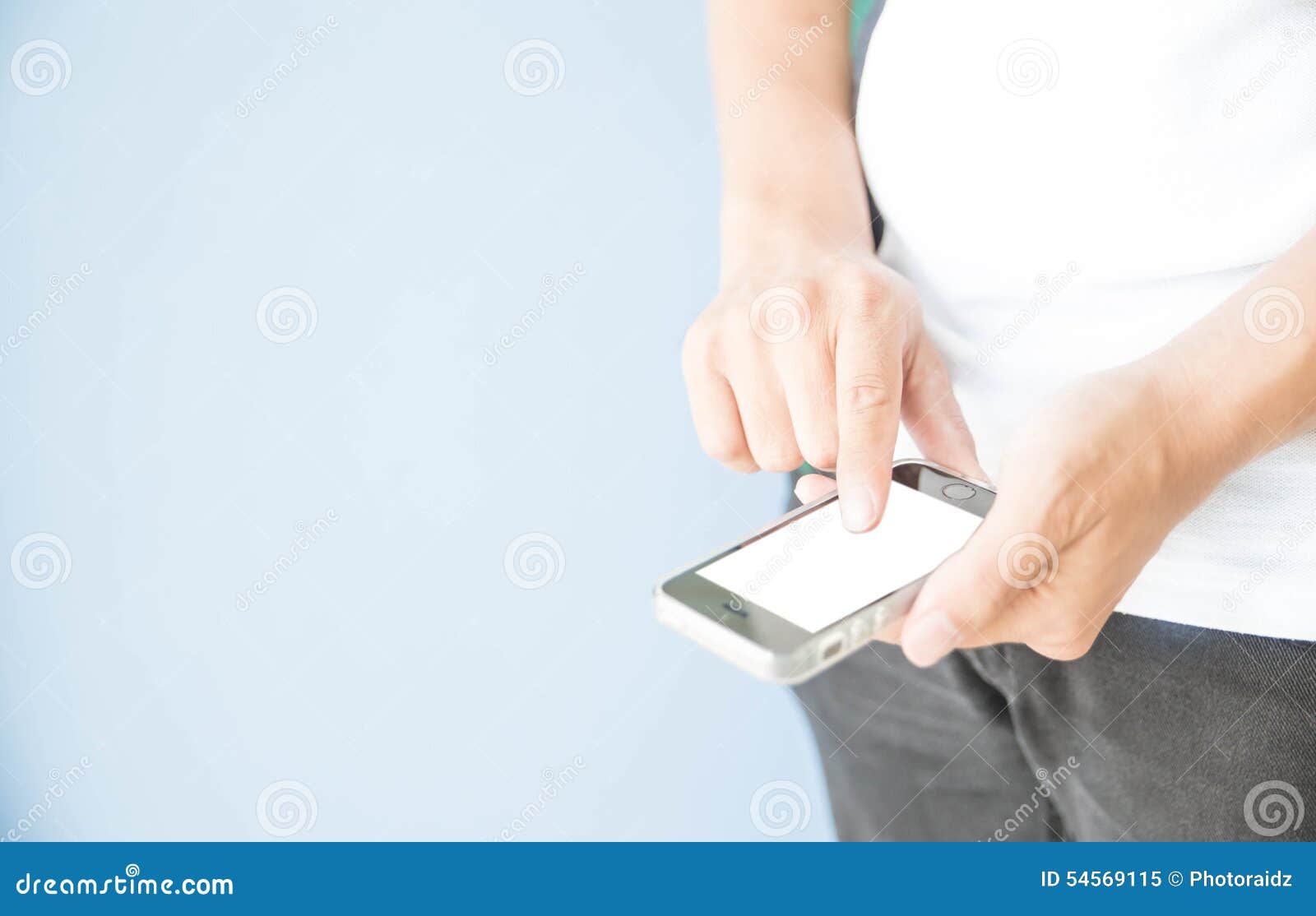 Man hand using smart phone stock image. Image of field - 54569115