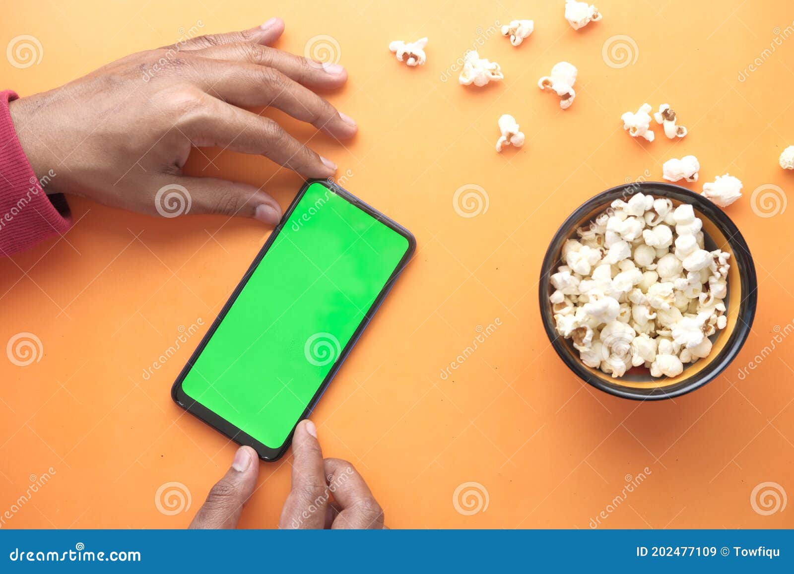 Man Hand Using Smart Phone and Eating Popcorn Stock Image - Image of ...