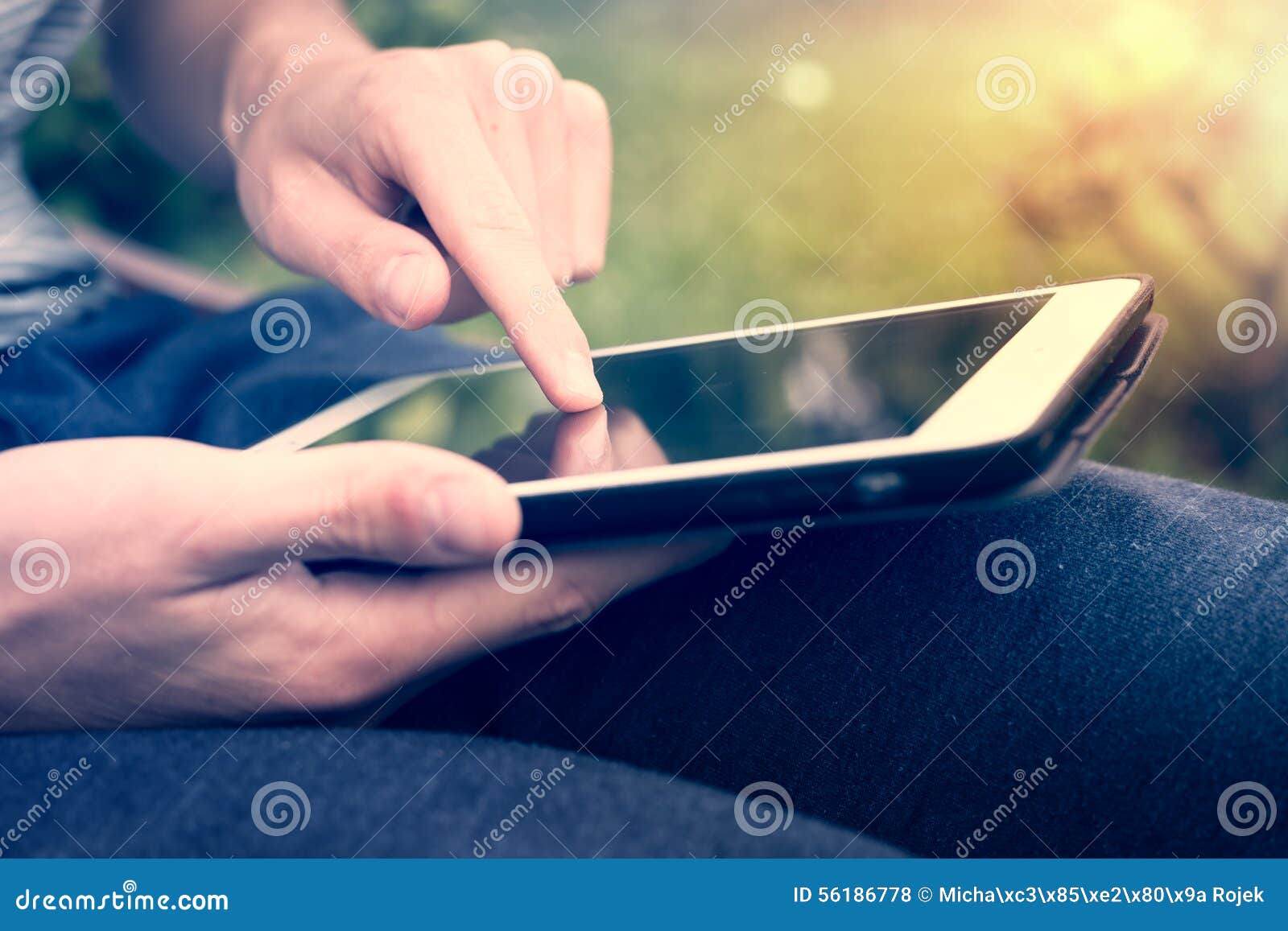 Man Hand Using White Tablet in the Garden. Stock Photo - Image of ...