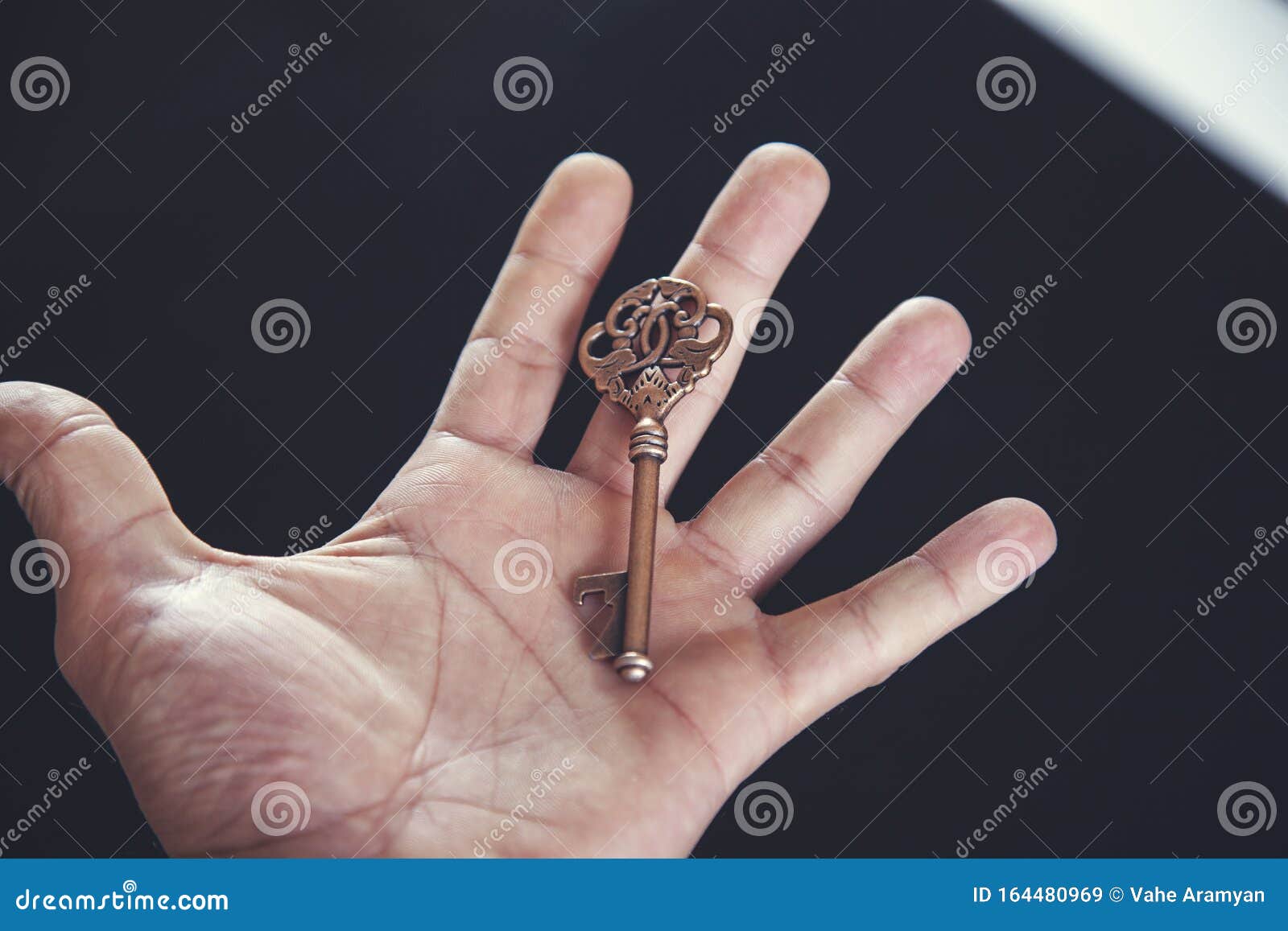 Man hand vintage key stock image. Image of large, round - 164480969