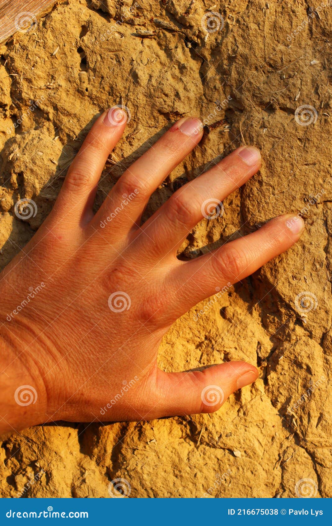 Man hand on wall closeup stock photo. Image of challenge - 216675038
