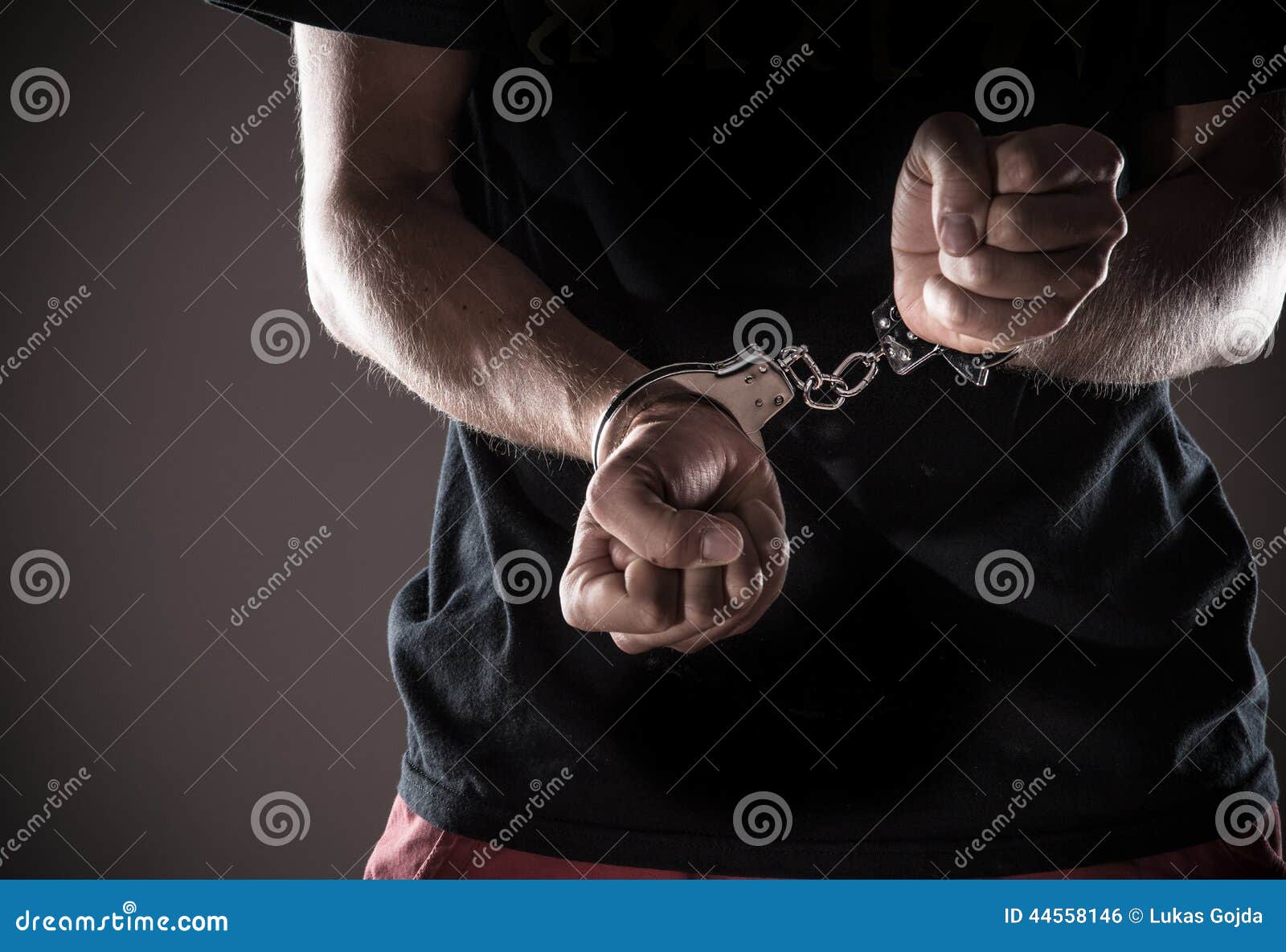Man handcuffed hands stock photo. Image of dark, fist - 44558146