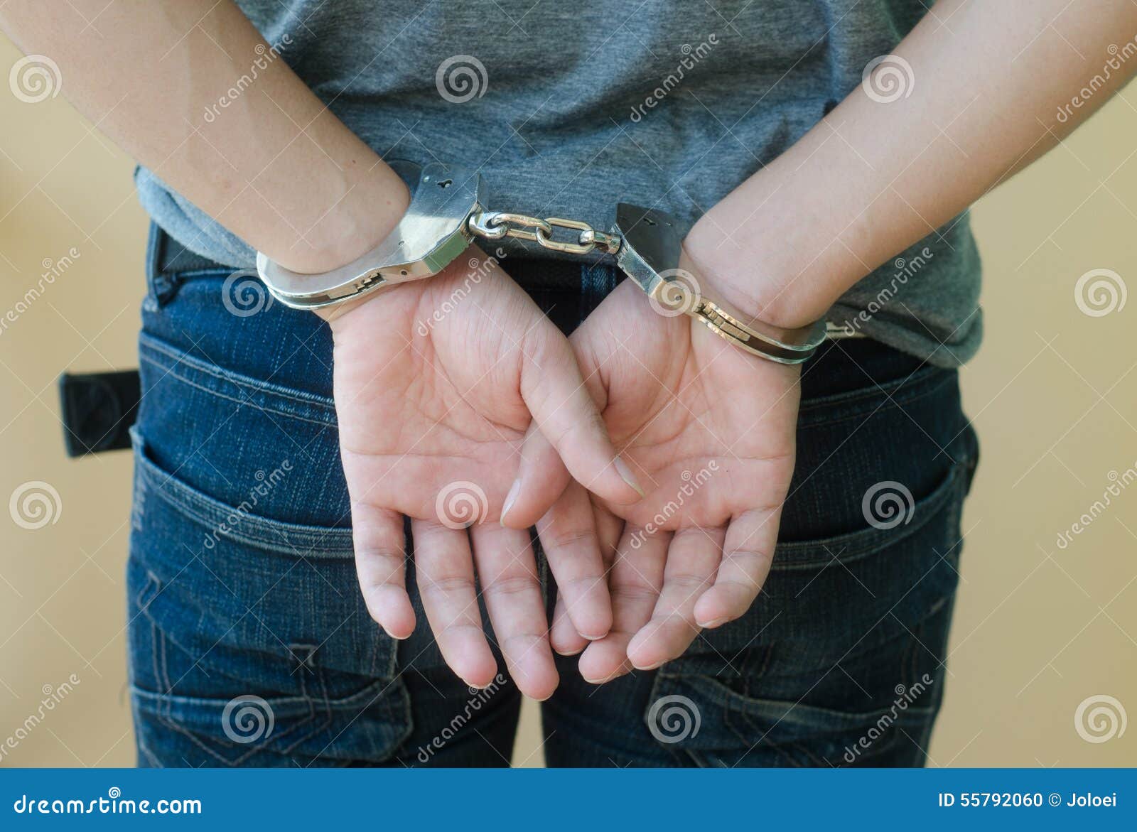 Man in handcuffs stock photo. Image of back, hands, metal - 55792060