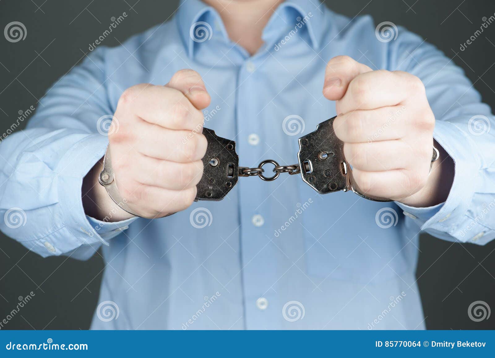 Man in Handcuffs and Blue Shirt Stock Photo - Image of crime, arrest ...