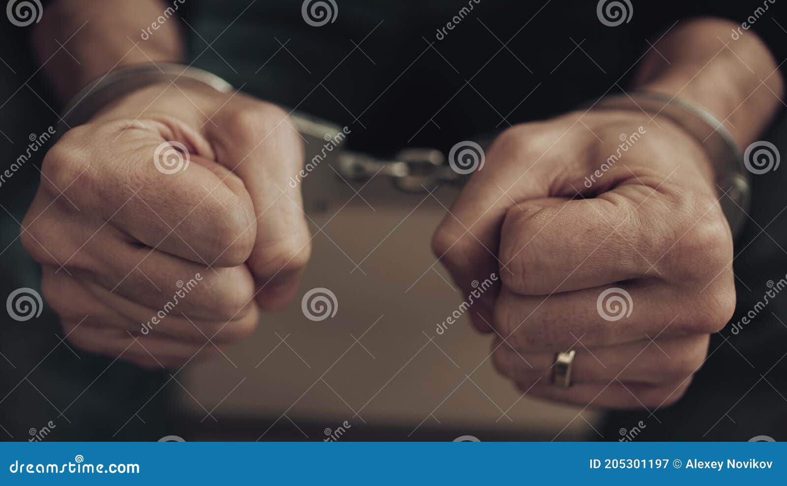 Fists of a Man in Handcuffs Stock Image - Image of closeup, prison ...