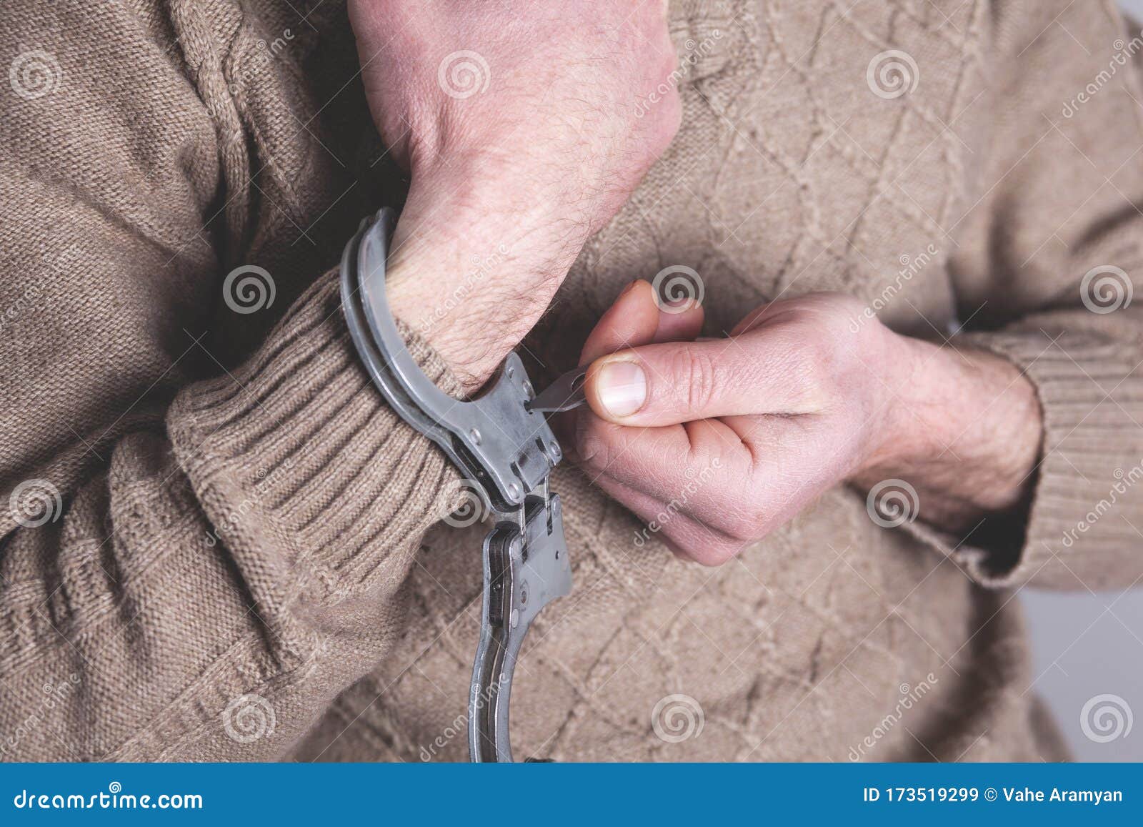 Man handcuffs and key stock image. Image of prisoner - 173519299