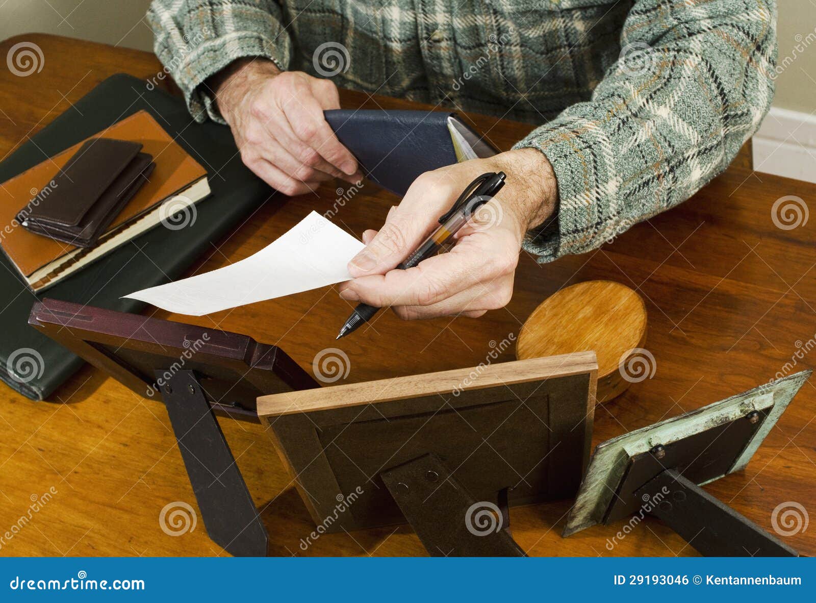 Man Handing Over Personal Check Stock Photo - Image of shirt, casual ...