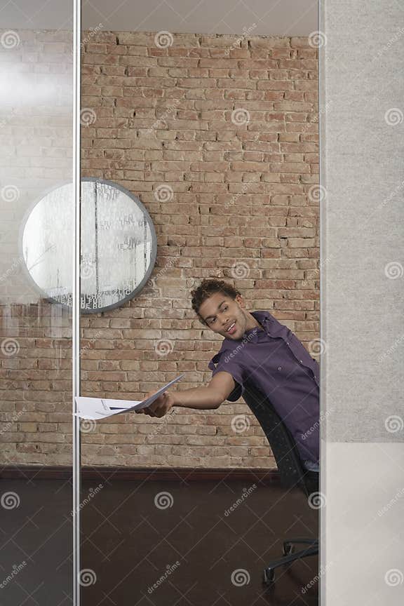 Man Handing Papers in Office Stock Photo - Image of worker, door: 191843852