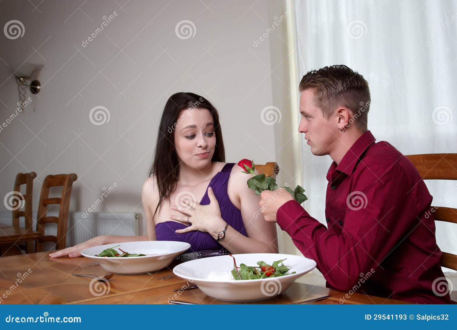 A Man Handing a Red Rose To His Girlfriend Stock Image - Image of youth ...