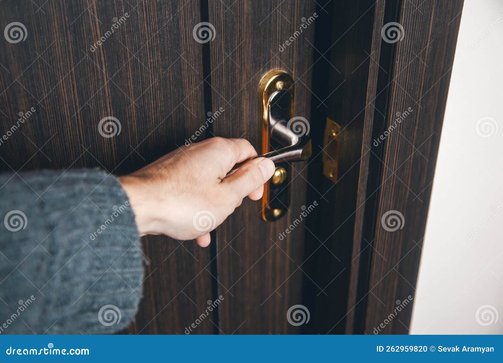 Man in handle door stock photo. Image of safety, doorway - 262959820