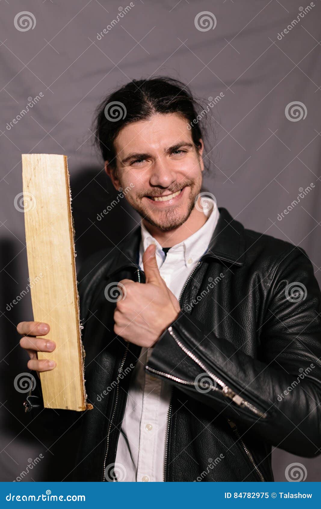 Man in the Hands of Birch Logs Stock Image - Image of serious, firewood ...