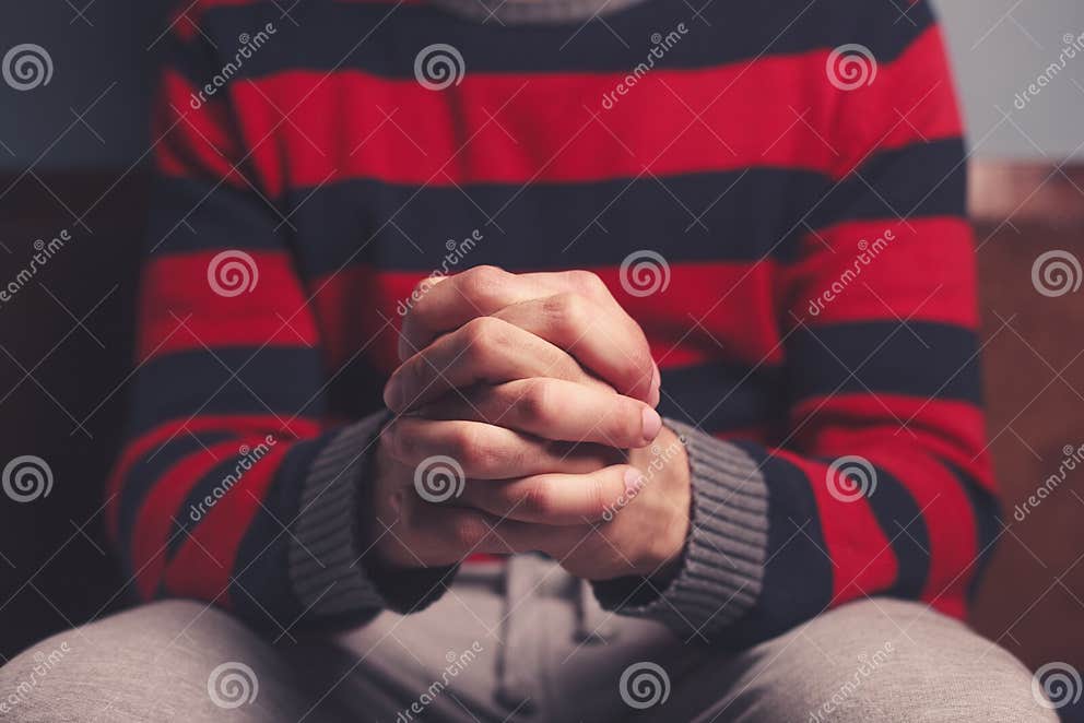 Man with Hands Folded in Prayer Stock Photo - Image of prayer, thought ...