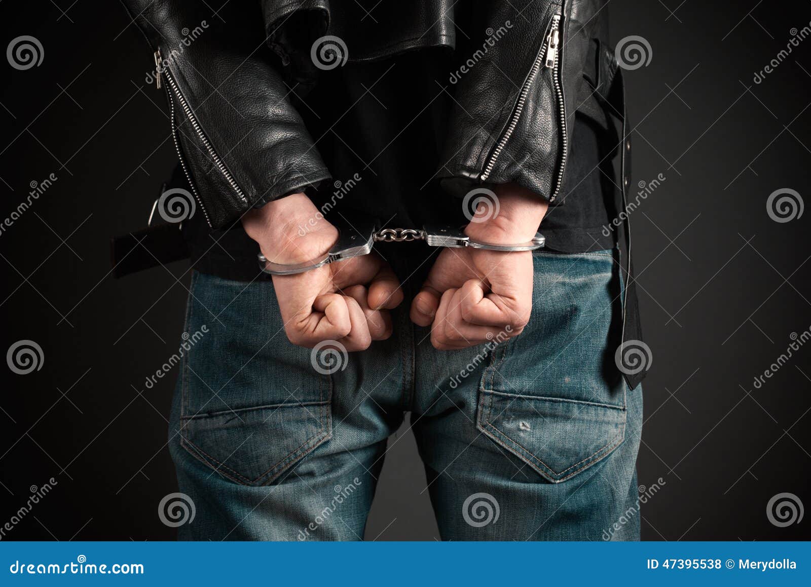 Man hands in handcuffs stock photo. Image of handcuffed - 47395538