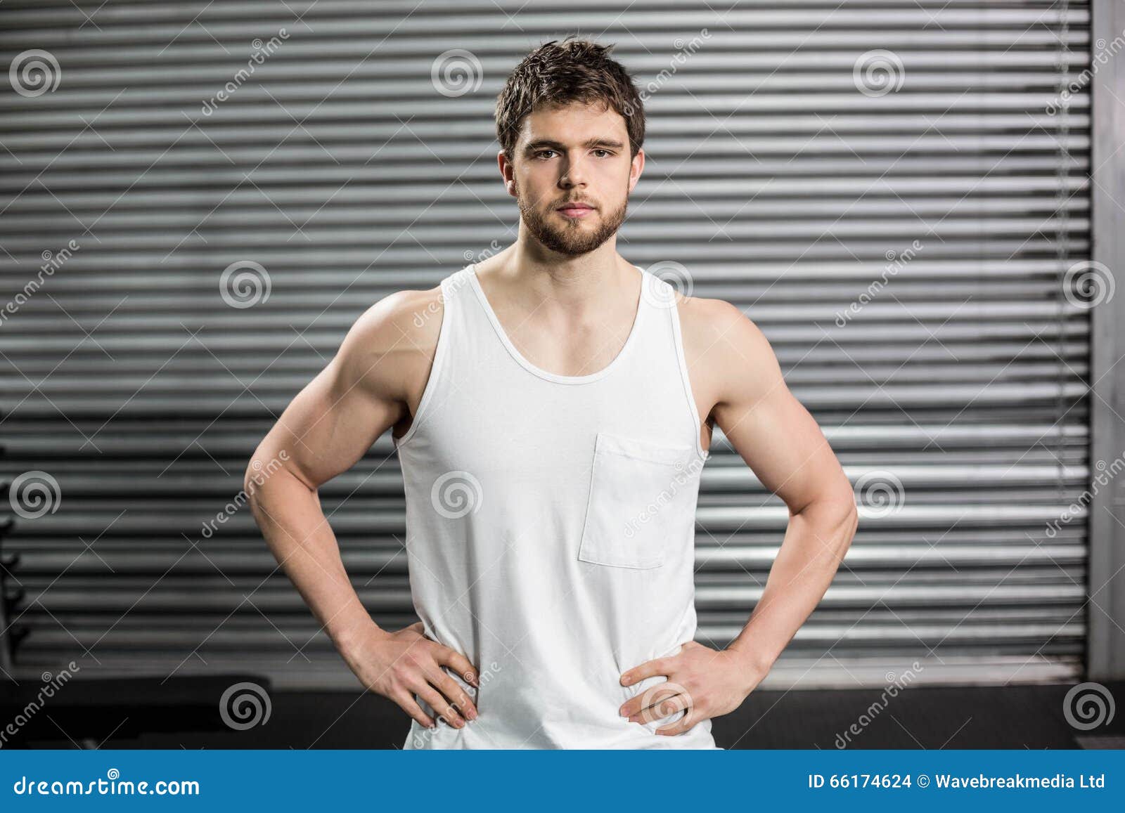 Man with hands on hips stock photo. Image of sportswear - 66174624