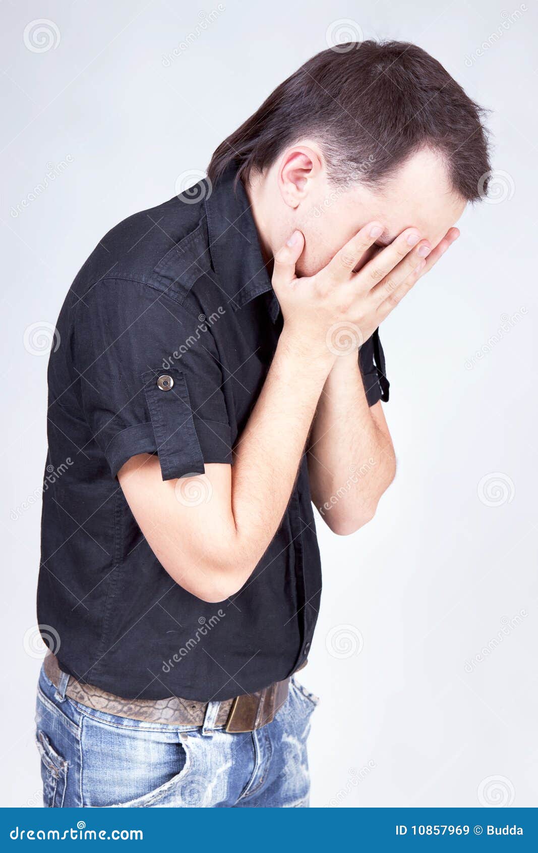 Man with hands on his face stock image. Image of groan - 10857969