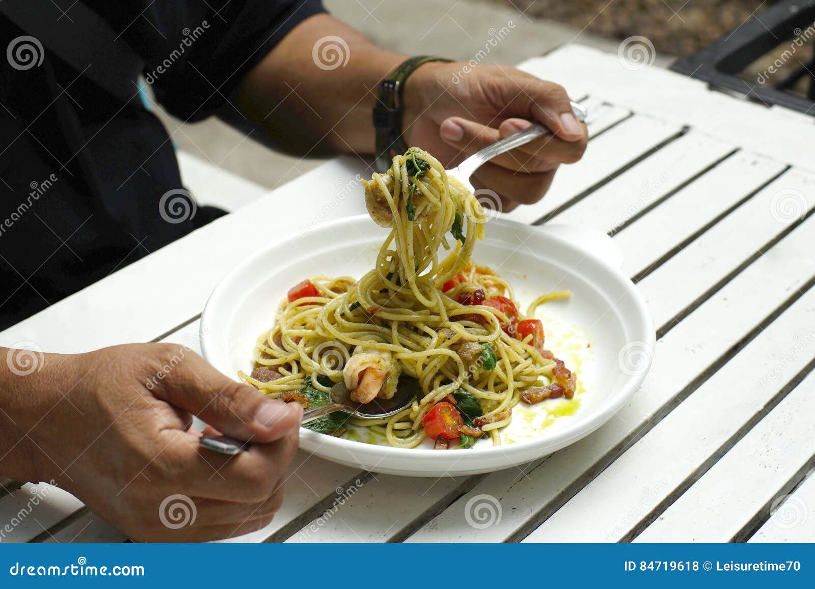 Man Hands Holding Fork and Spoon during Eating Spaghetti Stock Photo ...