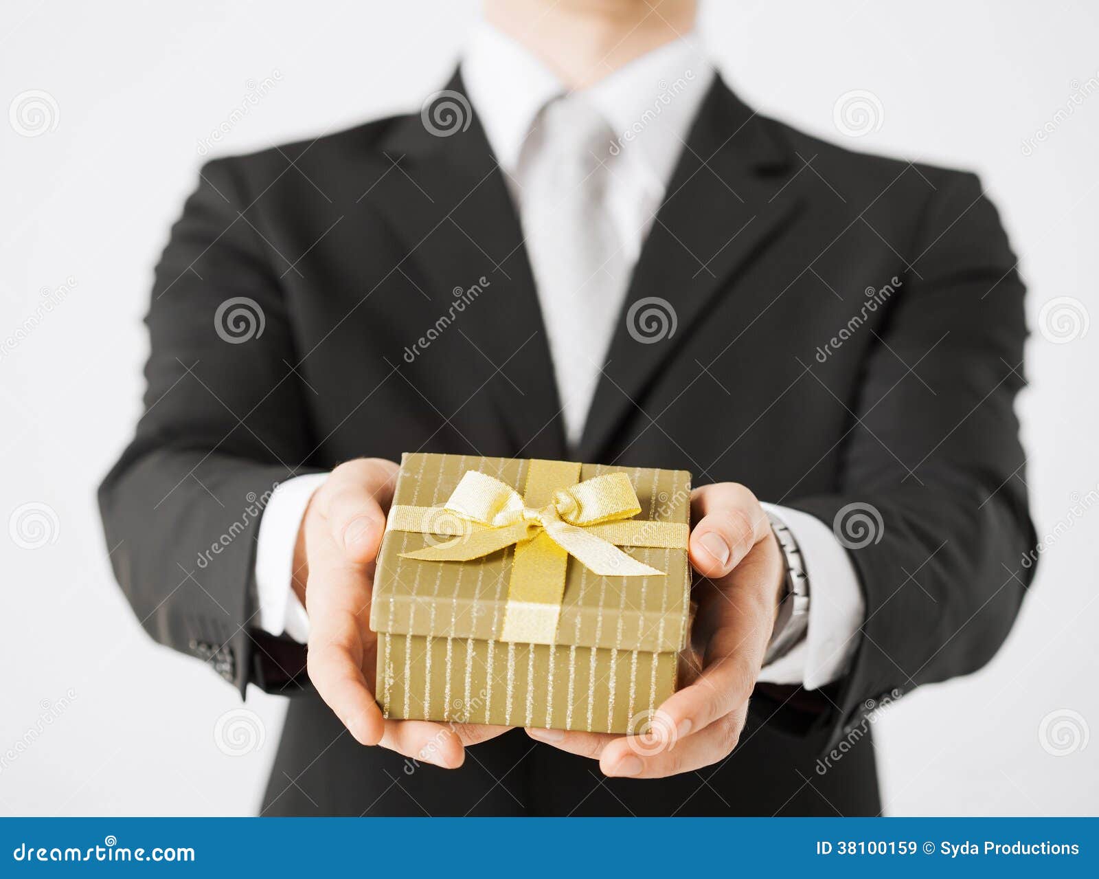 Man hands holding gift box stock image. Image of design - 38100159