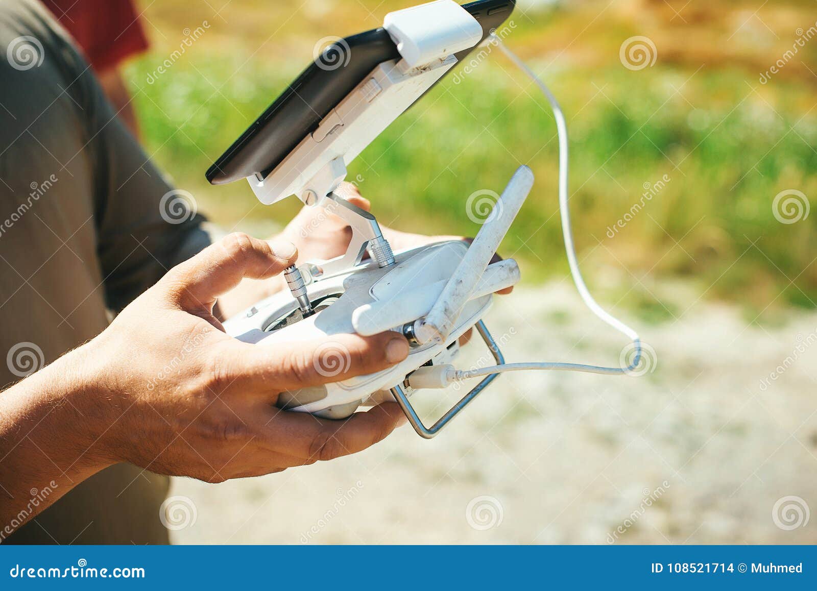 Man Hands Holding Quadrocopter Drone with Remote Control. Stock Photo ...