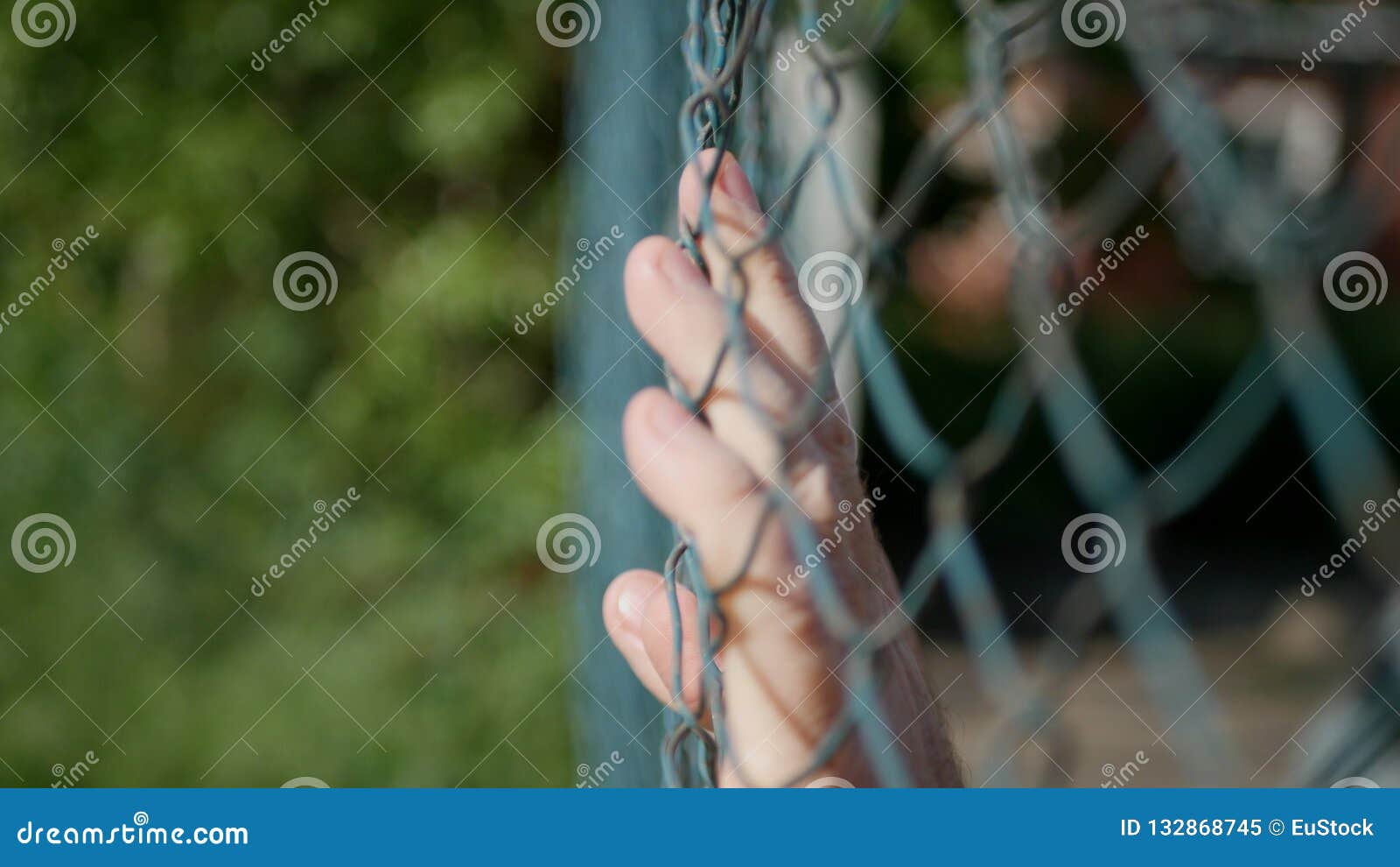 Man Hands Image Sliding on a Metallic Fence Stock Image - Image of ...