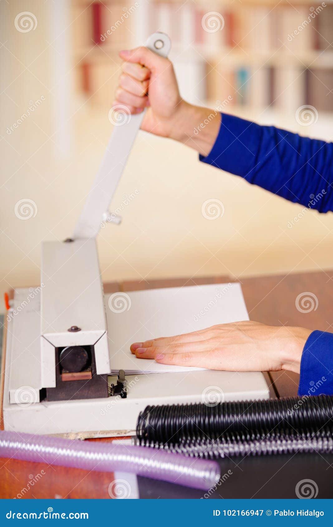 Man Hands Over a Binder Using for Binding Documents with Plastic Ring ...