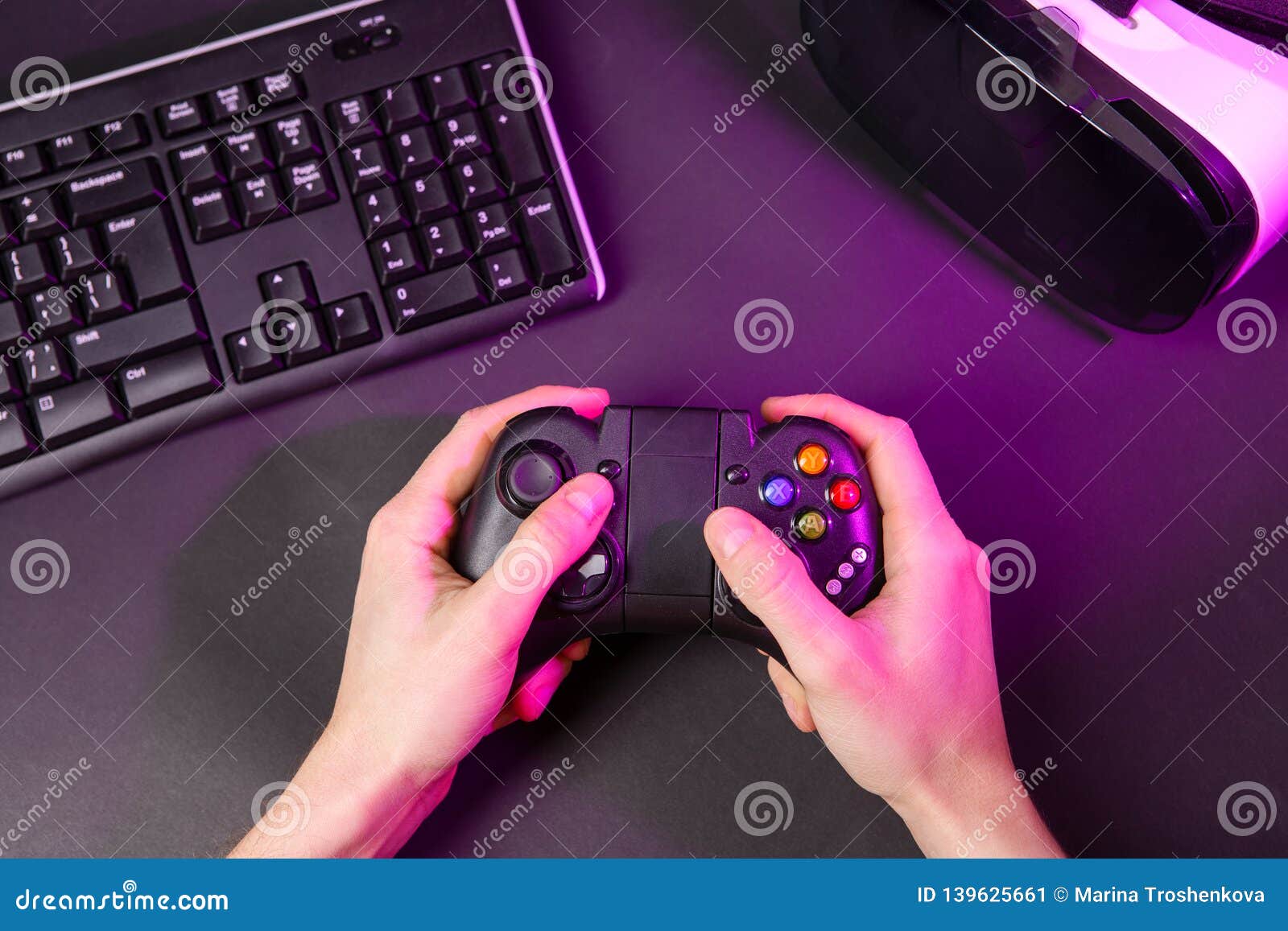 Man Hands Playing a Computer Game with a Game Joystick. Stock Image ...