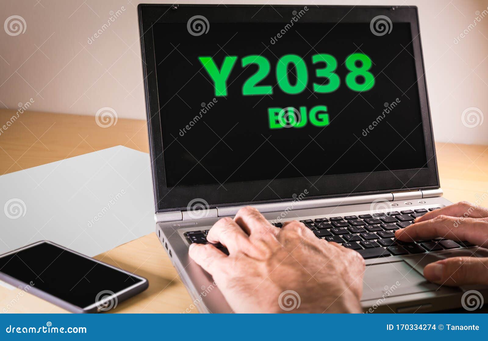 Man Hands Typing on a Laptop in Text Code. Y2038 Problem Concept Stock ...