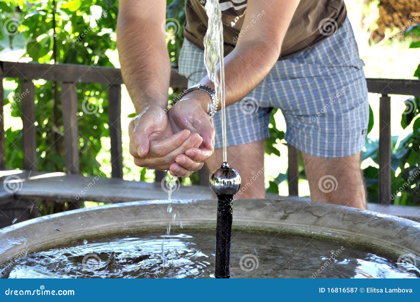 Man hands under water stock image. Image of fountain - 16816587