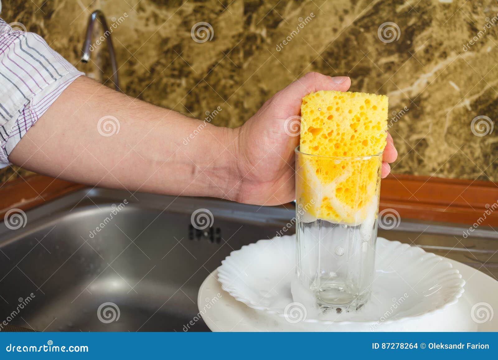 Man Hands, Washing a Sponge with Foam the Dishes at the Kitchen. Stock ...