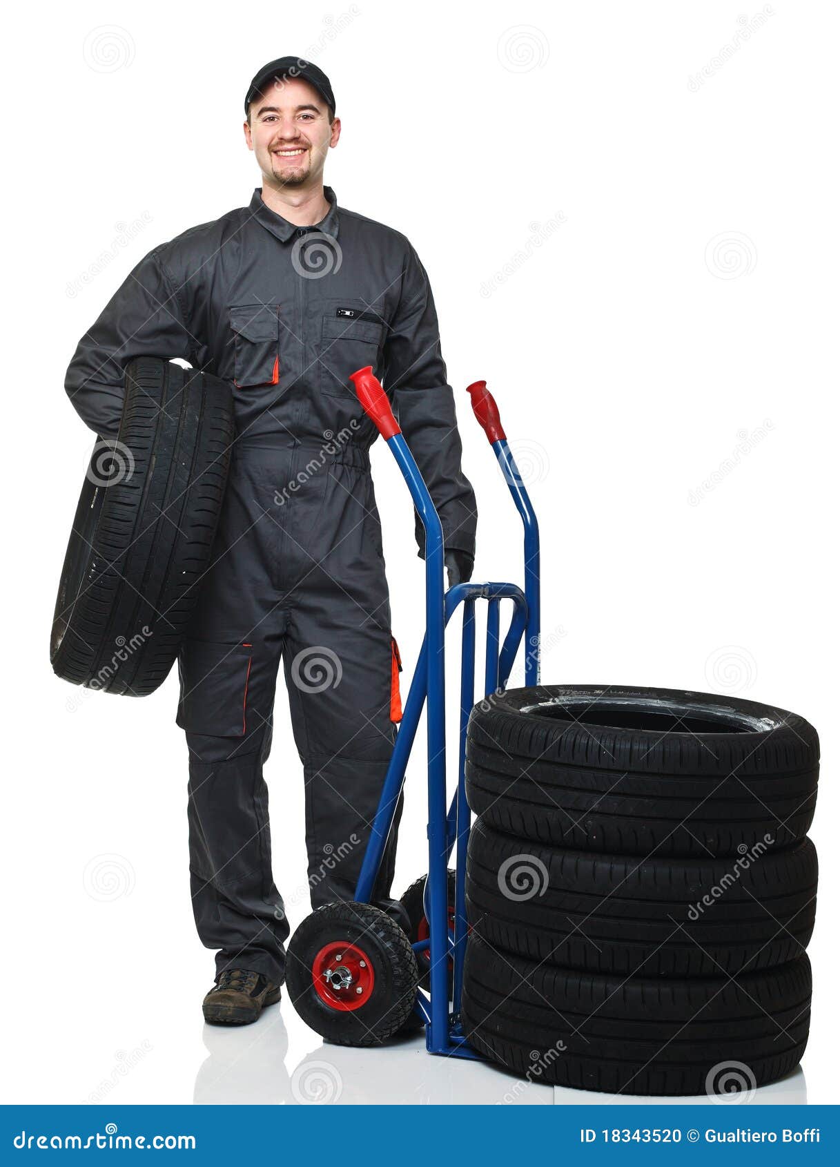 Man with Handtruck and Tires Stock Photo - Image of board, handtruck ...