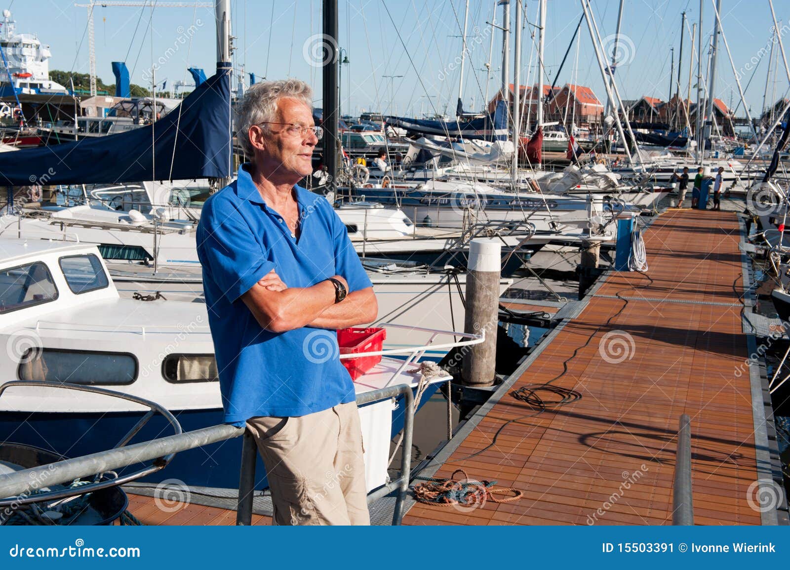 Man in harbor stock image. Image of sunshine, leaning - 15503391