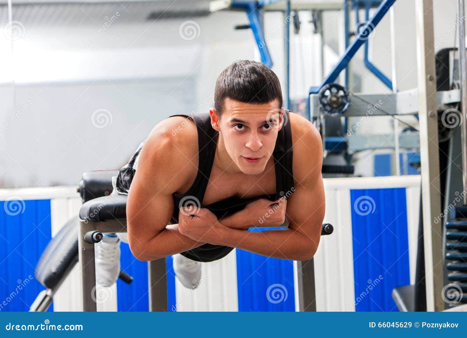Man Hard Working His Back on Hyperextension Bench. Stock Image - Image ...