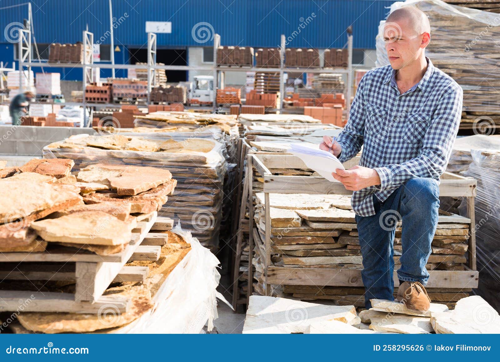 Man of Hardware Store Keeps Records of Natural Stone Tiles Stock Photo ...