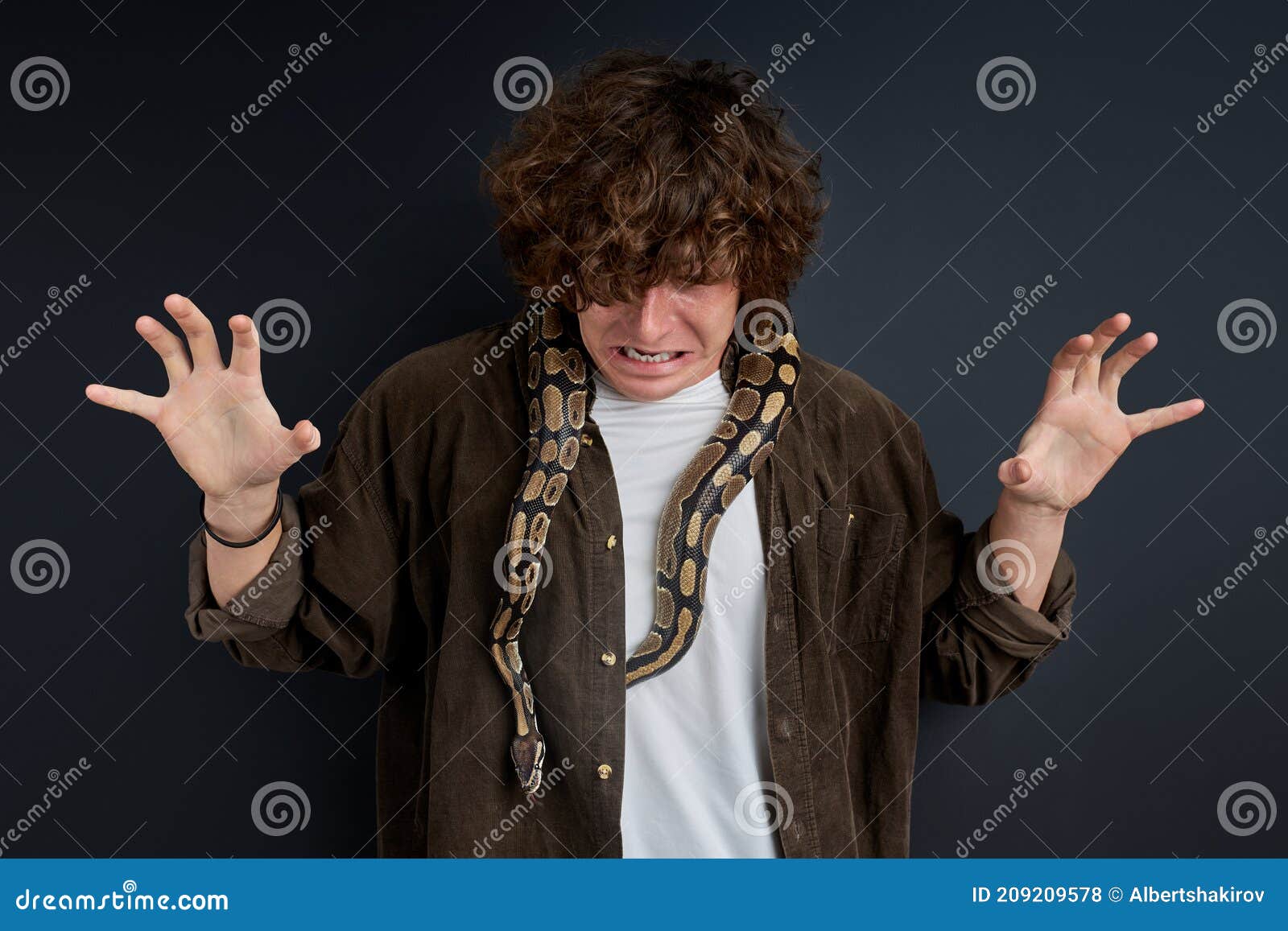 A Man Has a Panic Attack Having Snake on His Shoulders Stock Photo ...