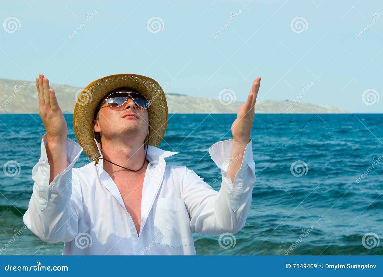 Man with hat on the beach stock image. Image of happiness - 7549409