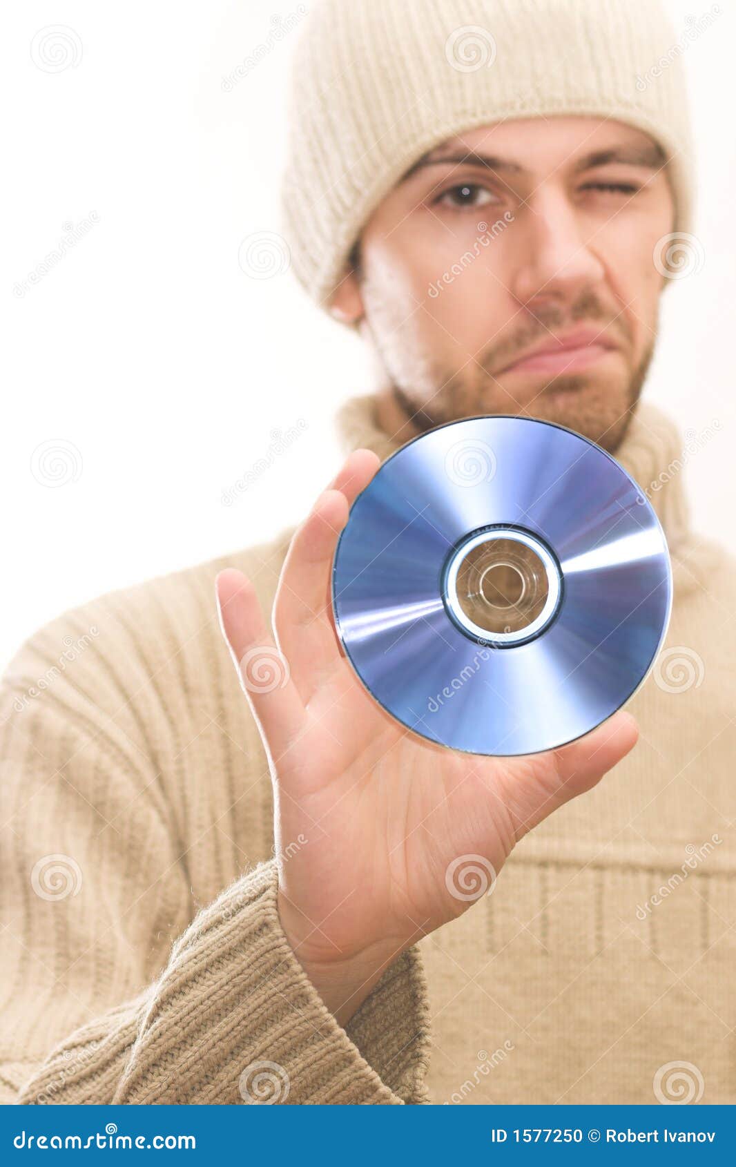 Man with hat holding CD stock photo. Image of casual, denial - 1577250