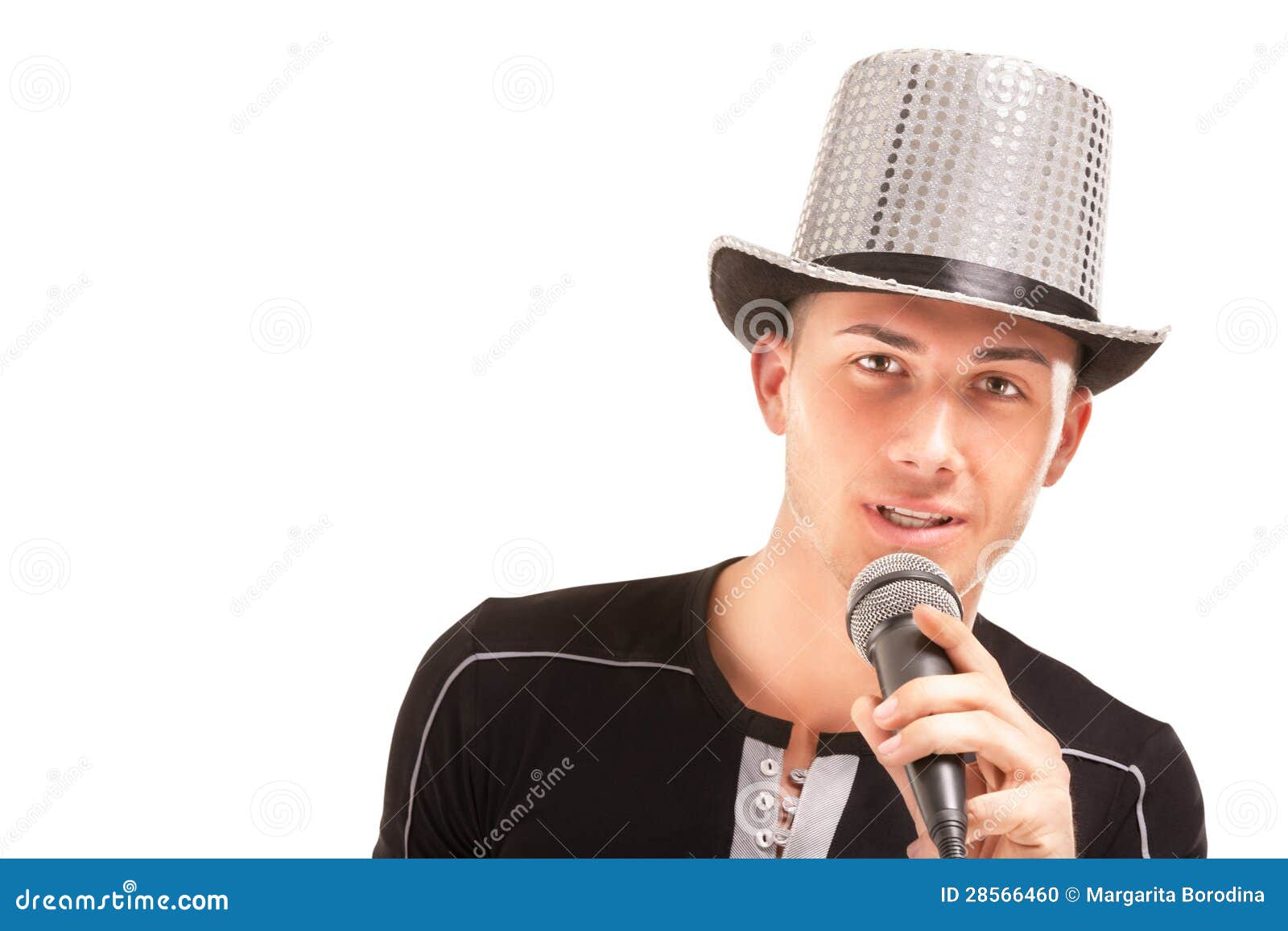 Man in the Hat Sings Expressively into Microphone. Stock Photo - Image ...