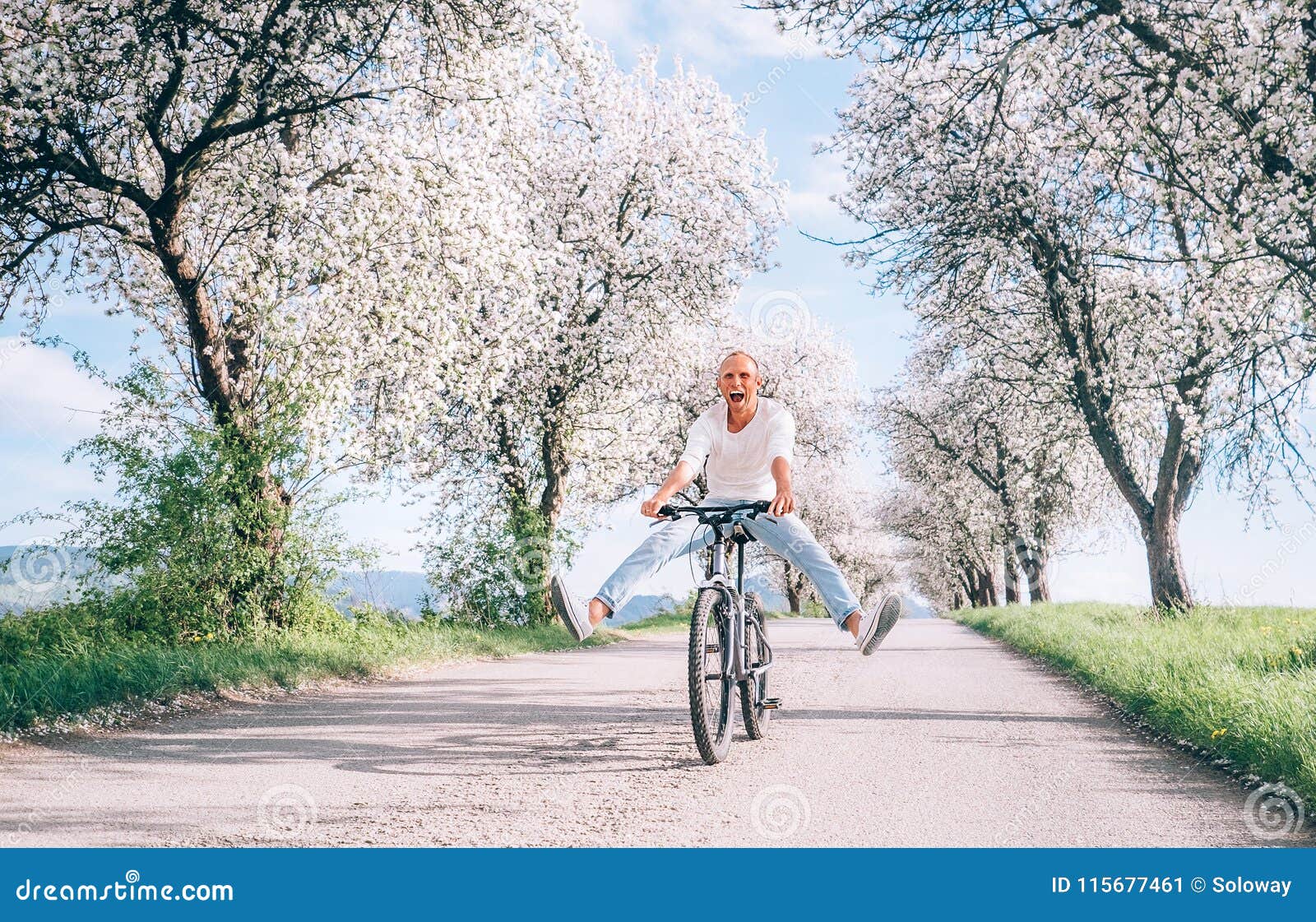 Man Have Fun when Rides a Bicycle on Country Road Stock Image - Image ...